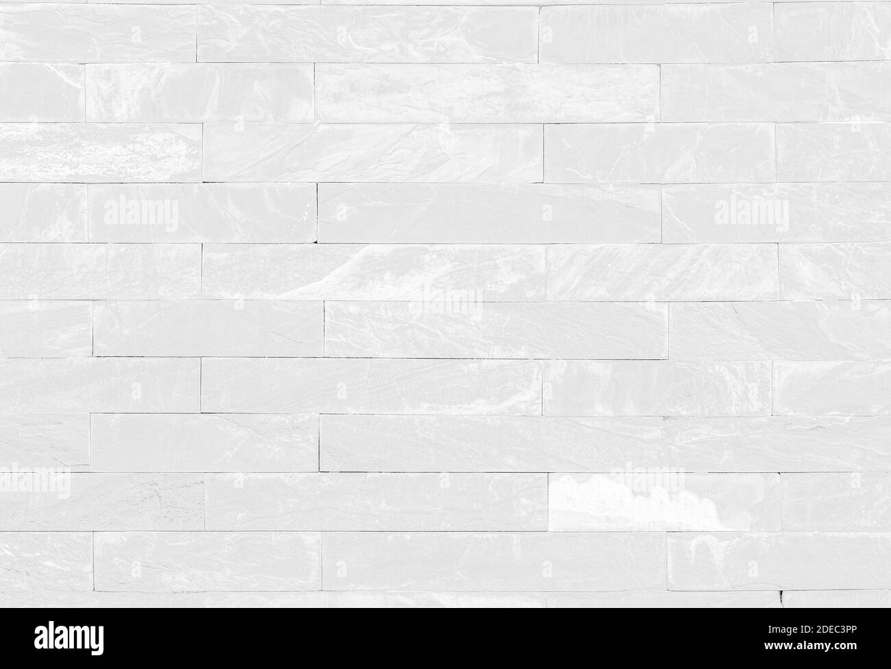 Close-up of white stone bricks wall background Stock Photo - Alamy
