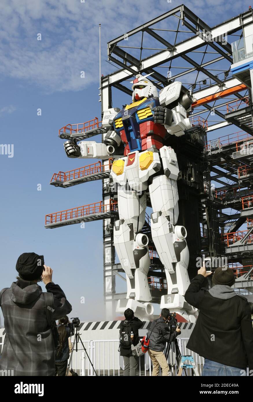 A 18-meter-high "life-size" moving statue of the Gundam robot from the ...