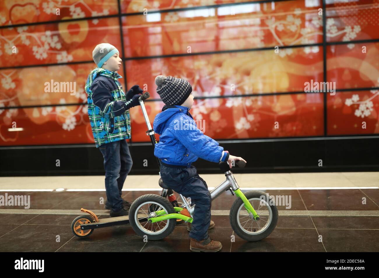 Two brothers waiting for train hi-res stock photography and images - Alamy