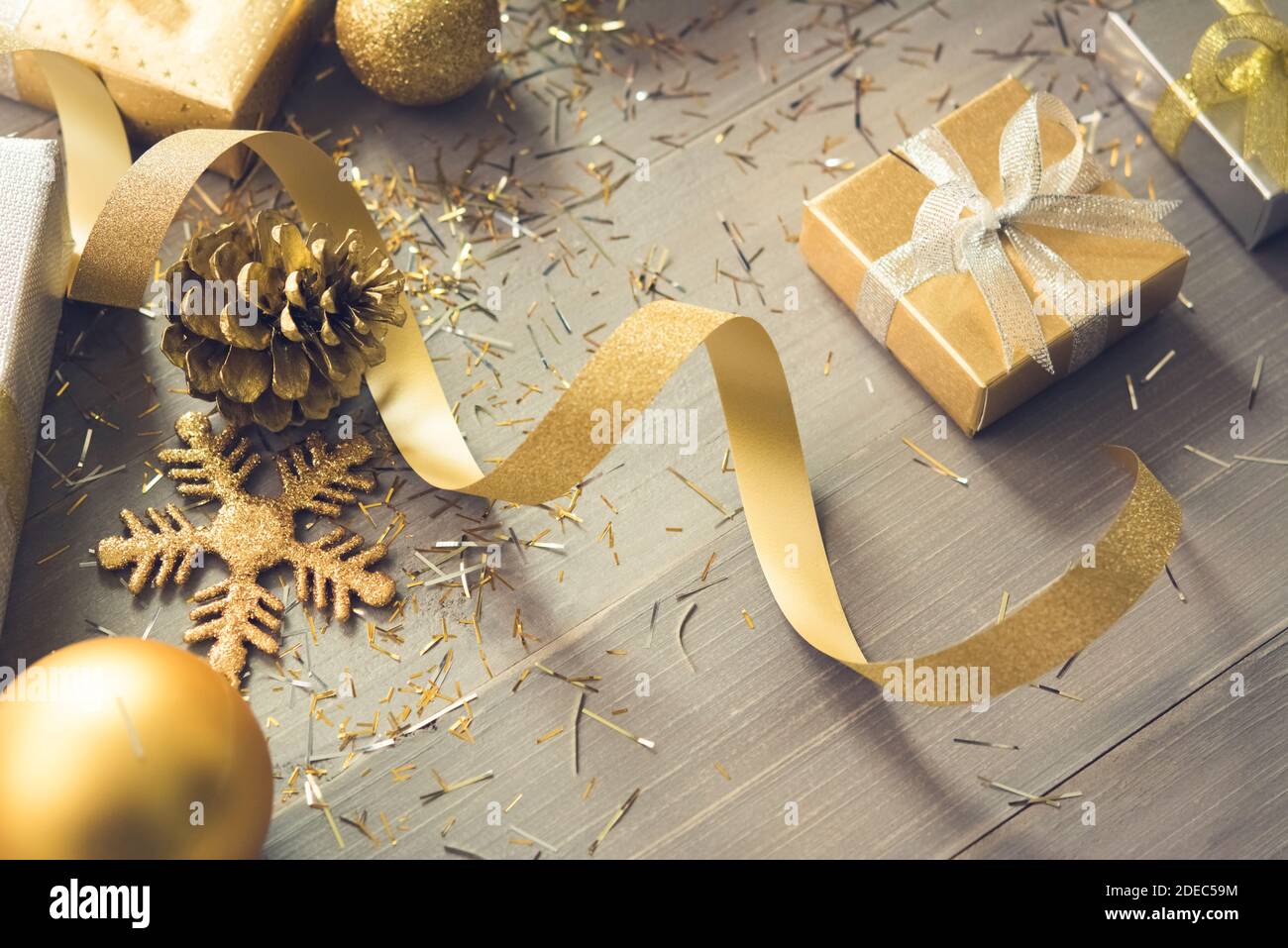 Sliver and gold shimmer Christmas gift boxes with glittering ribbon and ...
