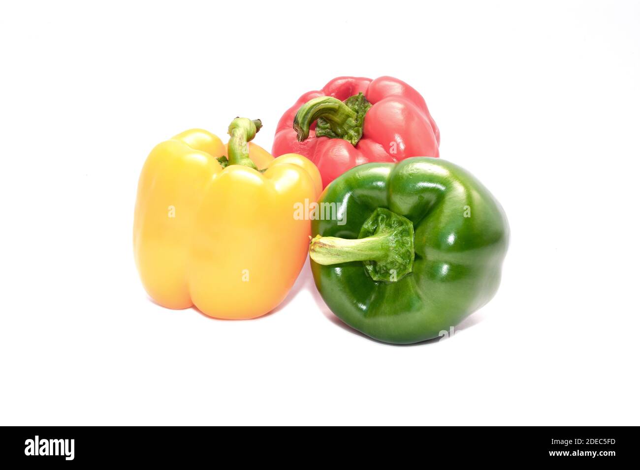 three bell peppers isolated on white background. Diet food and vegan ...