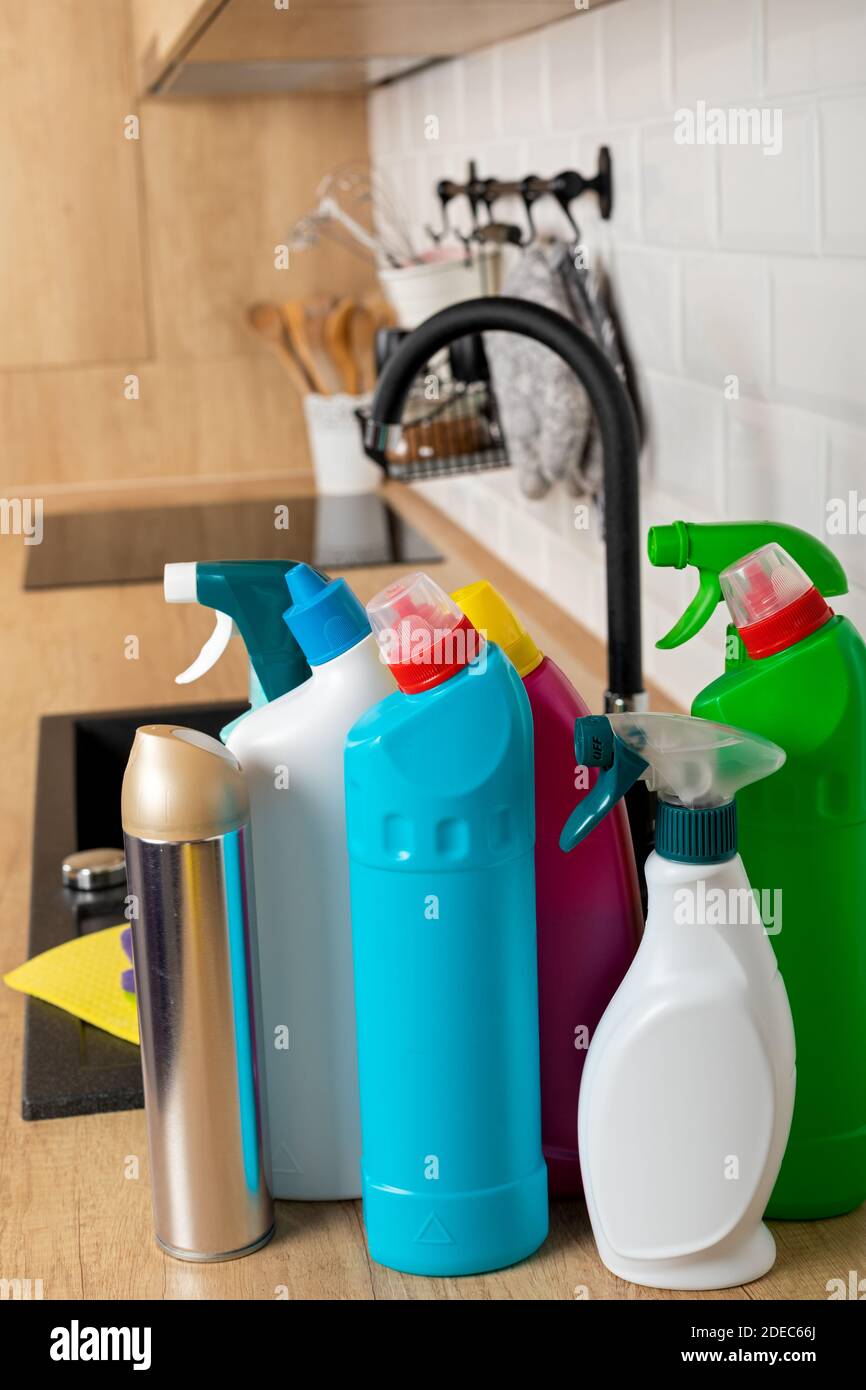 Colorful cleaning products in the kitchen Stock Photo - Alamy