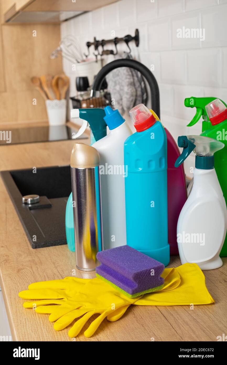 Colorful cleaning products in the kitchen Stock Photo - Alamy
