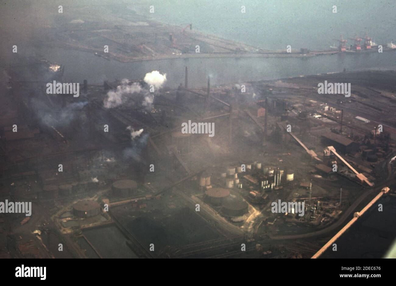 Industrial pollution and factory in the early 1970s ca. 1973 Stock ...
