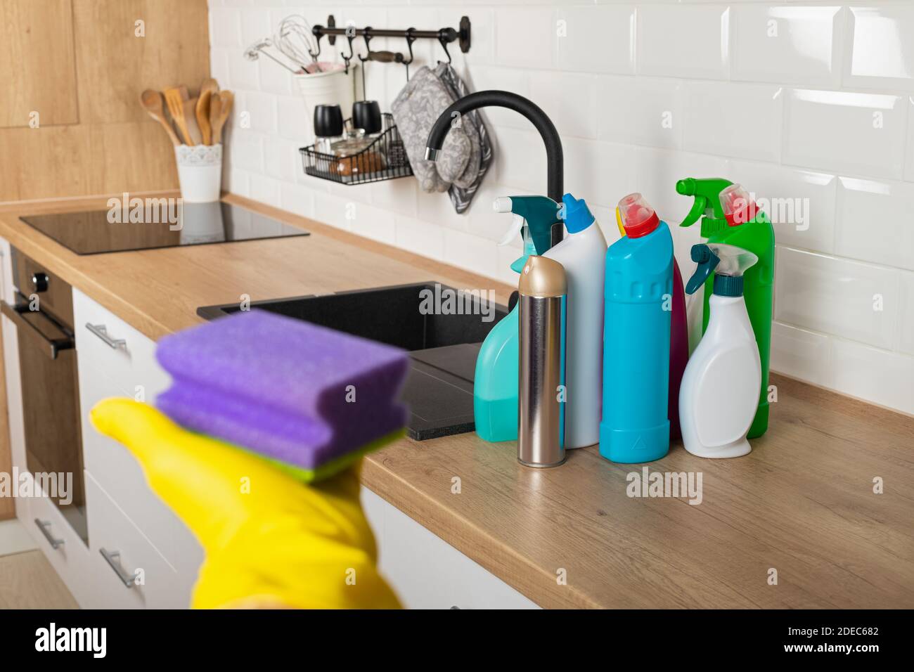 Colorful cleaning products in the kitchen Stock Photo - Alamy