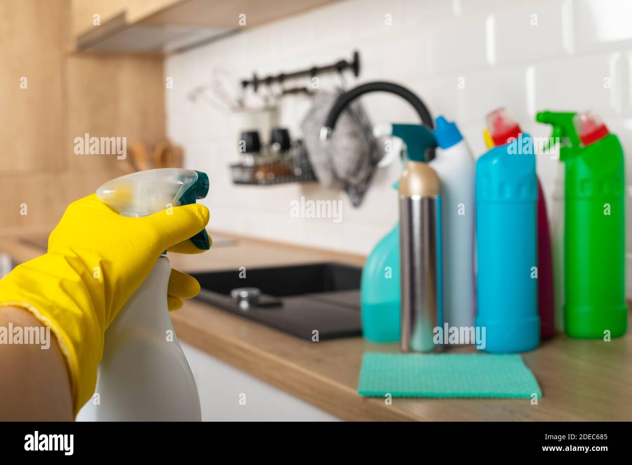 Colorful cleaning products in the kitchen Stock Photo - Alamy