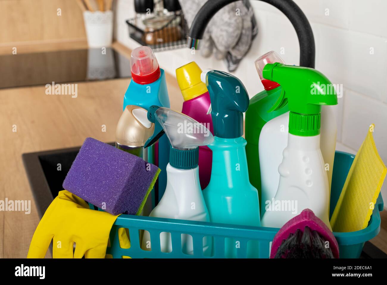 Colorful cleaning products in the kitchen Stock Photo - Alamy