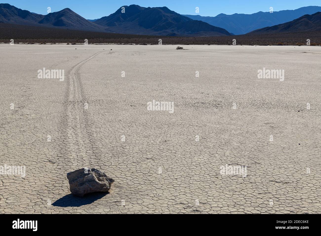 A trail follows a rock that moved across the Racetrack Playa in Death ...