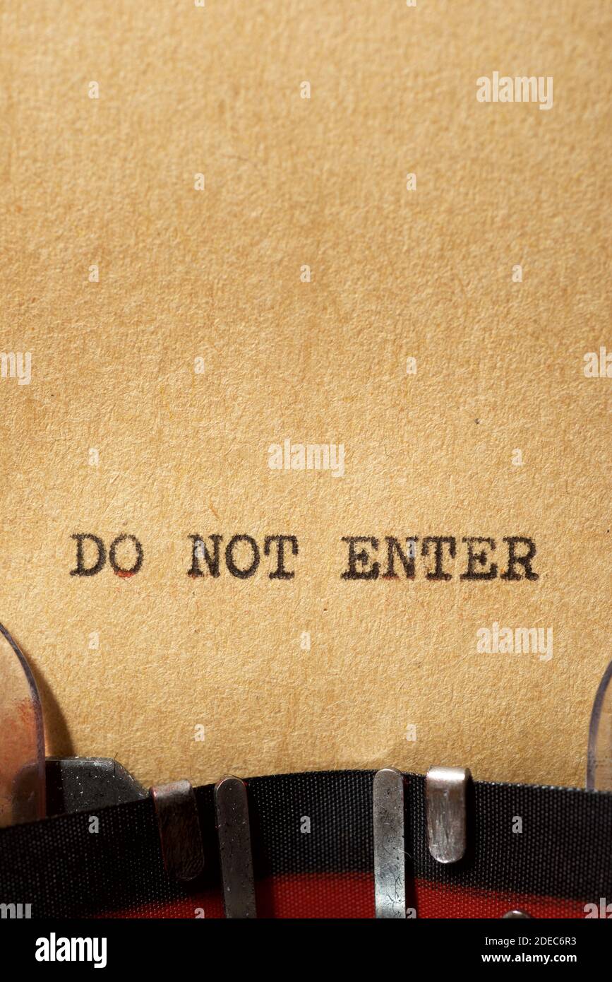 Do not enter phrase written with a typewriter Stock Photo - Alamy