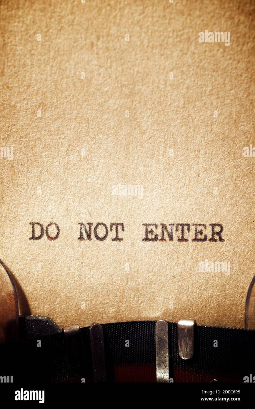 Do not enter phrase written with a typewriter Stock Photo - Alamy