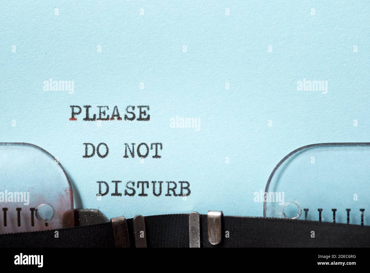 Please do not disturb phrase written with a typewriter Stock Photo - Alamy