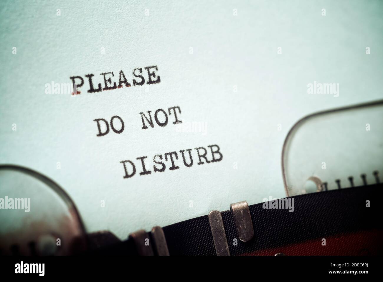 Please do not disturb phrase written with a typewriter Stock Photo - Alamy