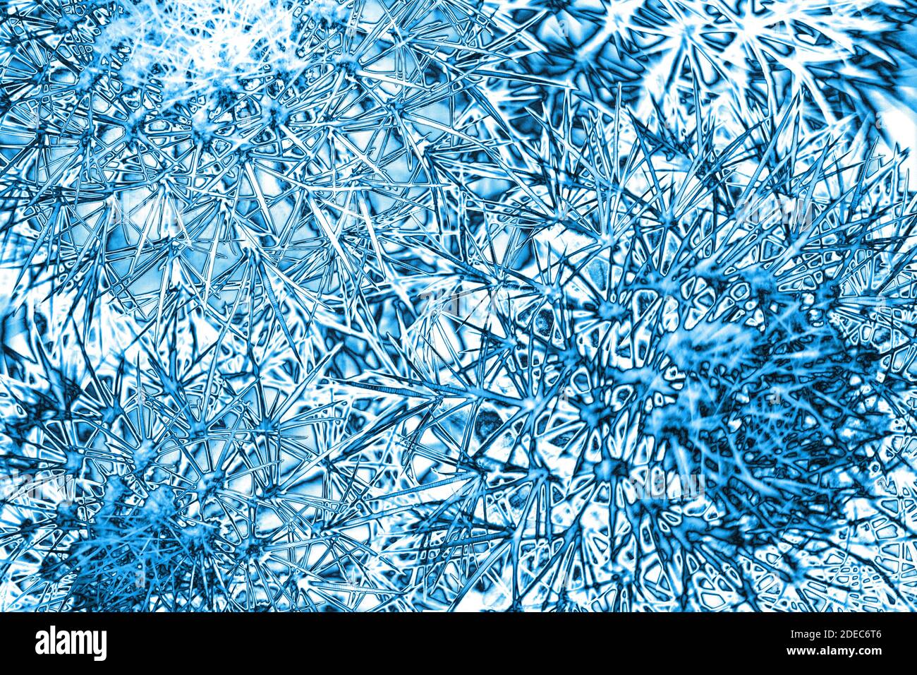Abstract blue ice prickly spikes background, icy needles, frosty ...