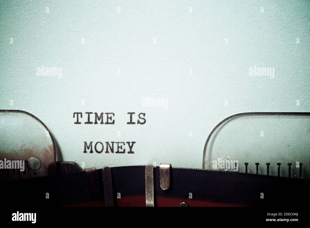 Time is money phrase written with a typewriter Stock Photo - Alamy