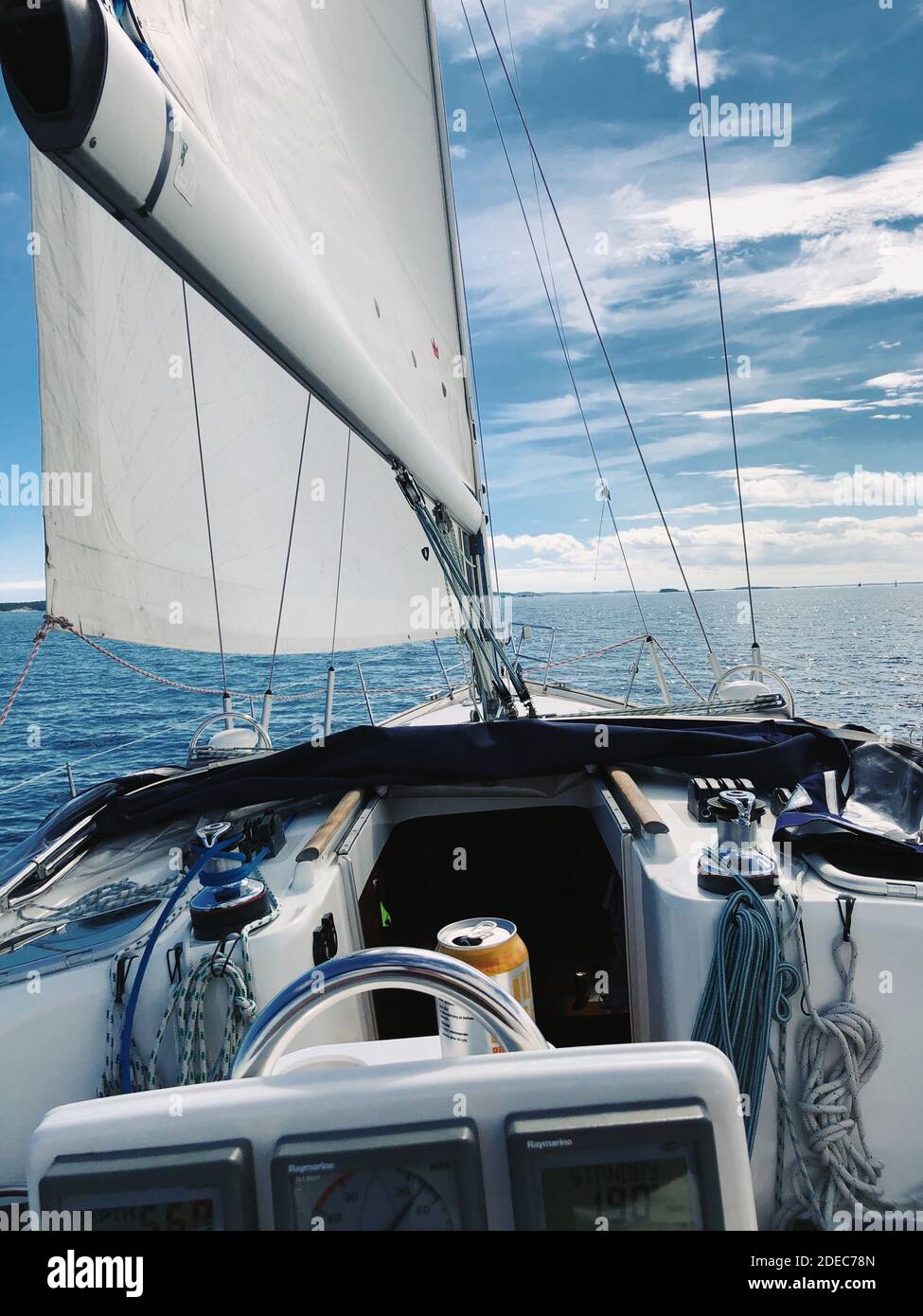 A fantastic marine scenery under a beautiful cloudscape seen inside of ...
