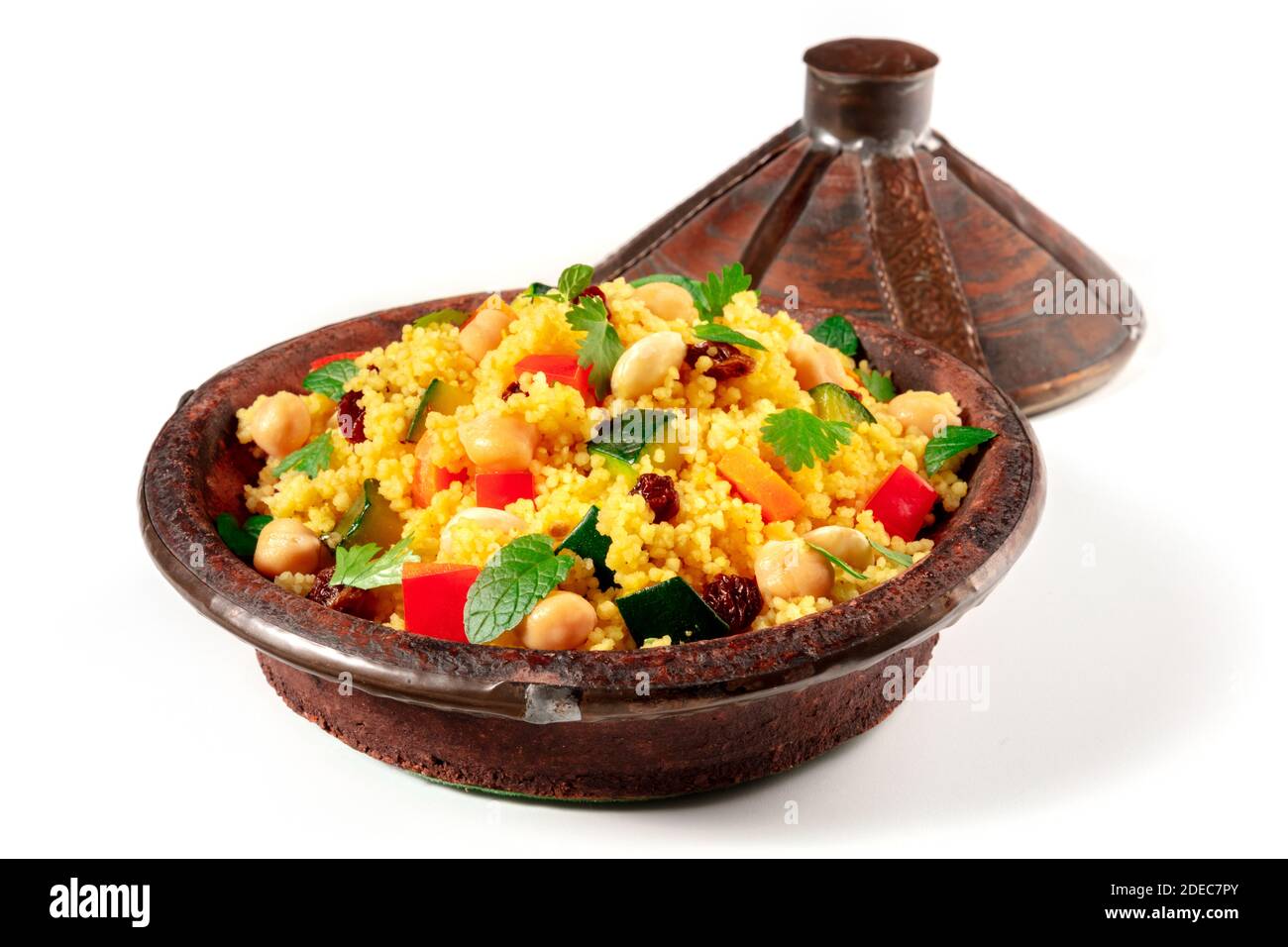 Moroccan couscous in a tagine on a white background Stock Photo - Alamy