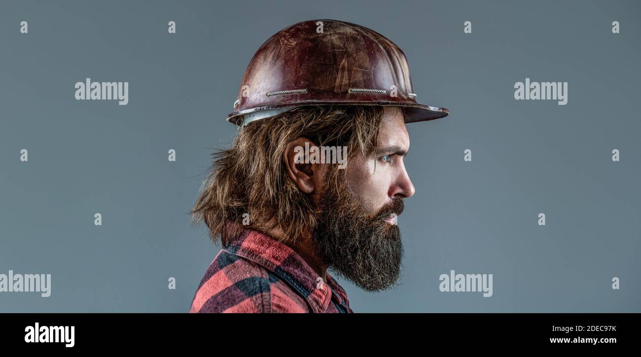 Building, industry, technology - builder concept. Bearded man worker ...