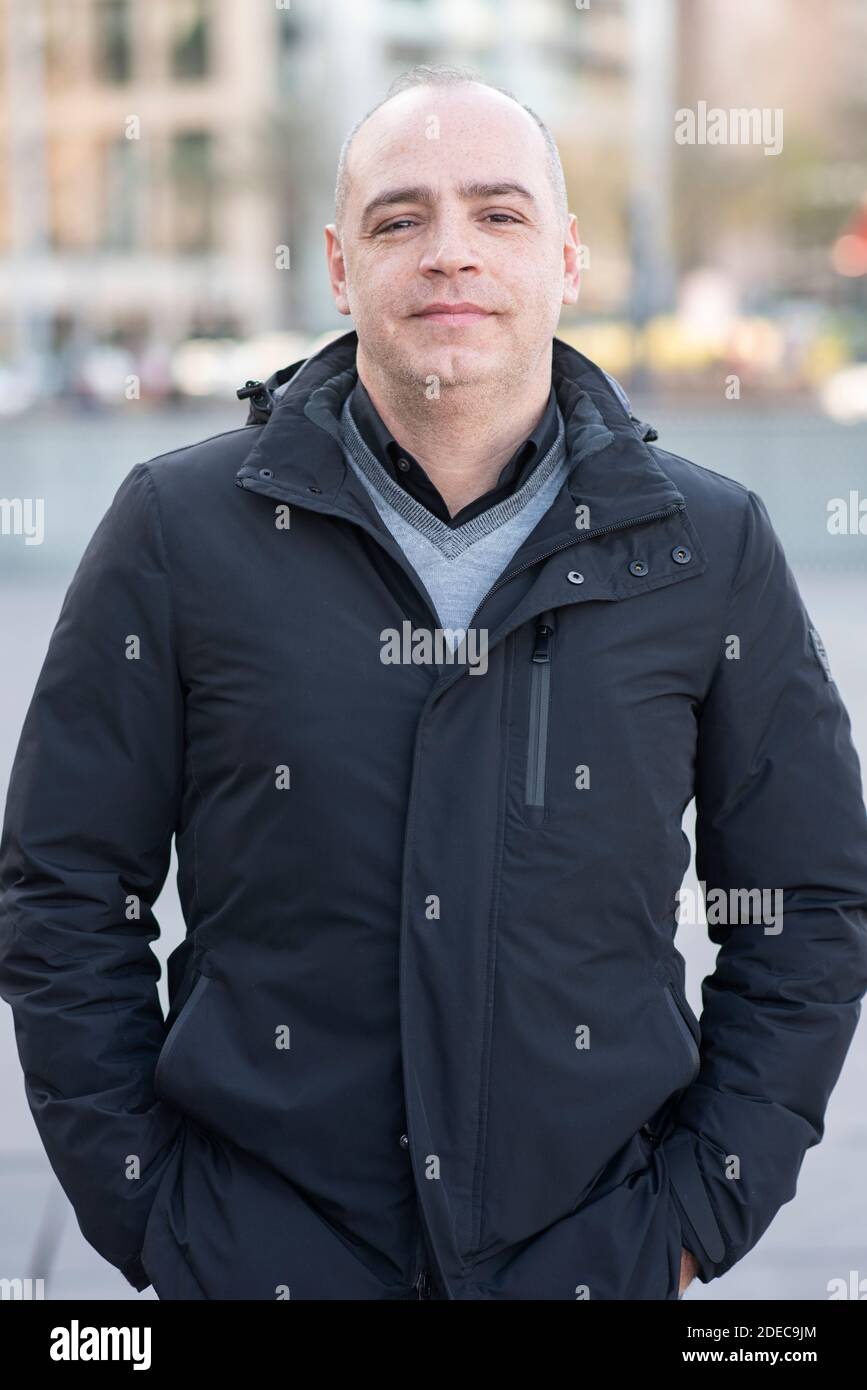 45 years old man looking at camera msiling outdoors Stock Photo - Alamy