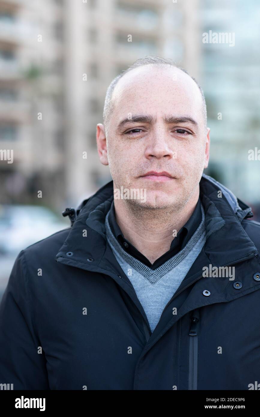 45 years man looking at camera outdoors Stock Photo - Alamy