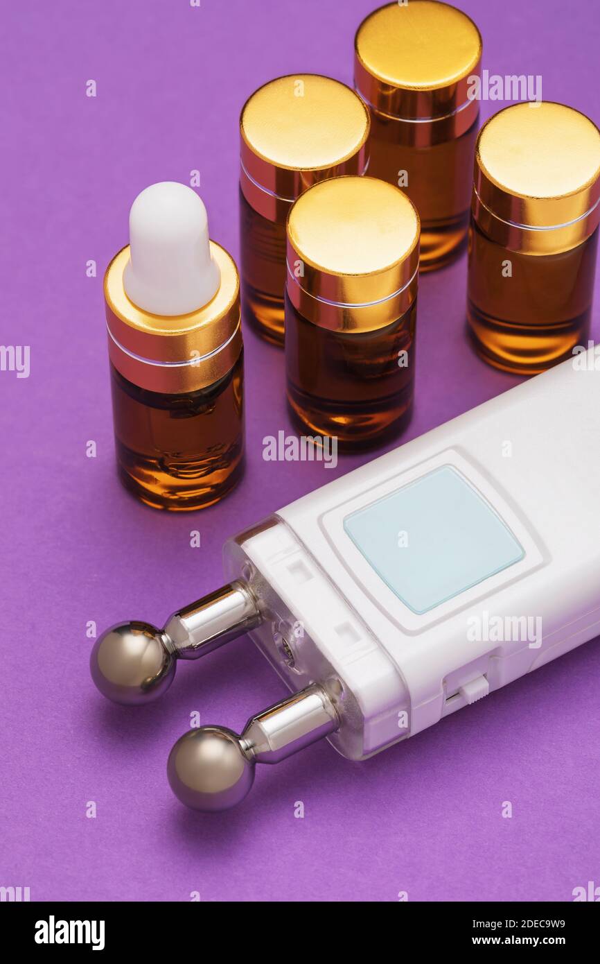 A set of gels in ampoules and a device for microcurrent stimulation of ...