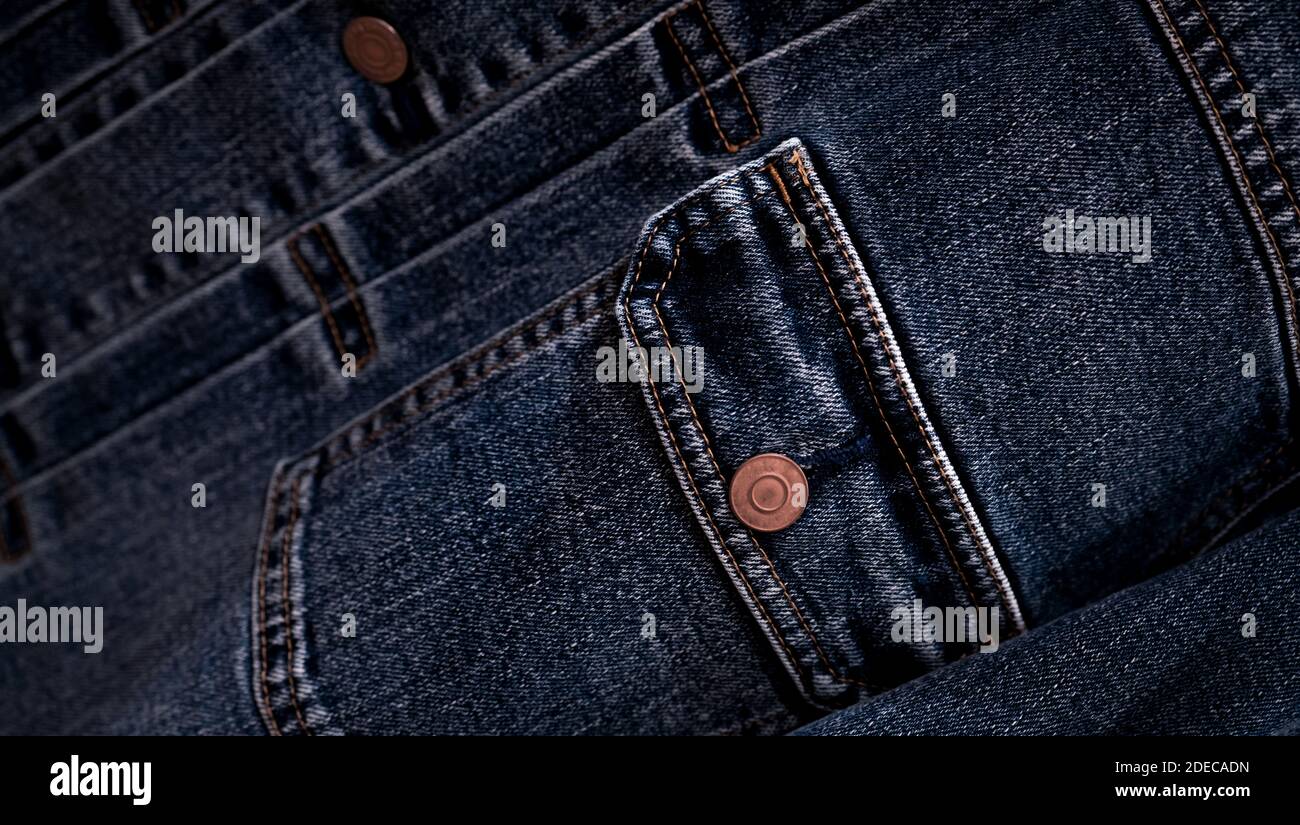 Selective focus on denim jean jacket pocket in clothes shop. Denim ...