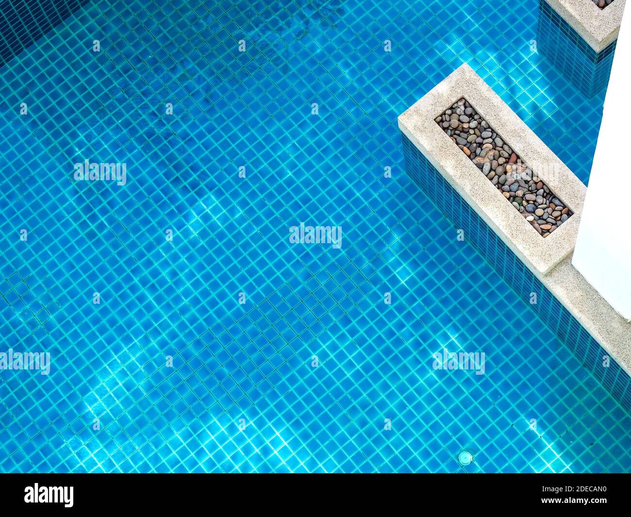 Blue pool background near the building. Swimming pool bottom background ...