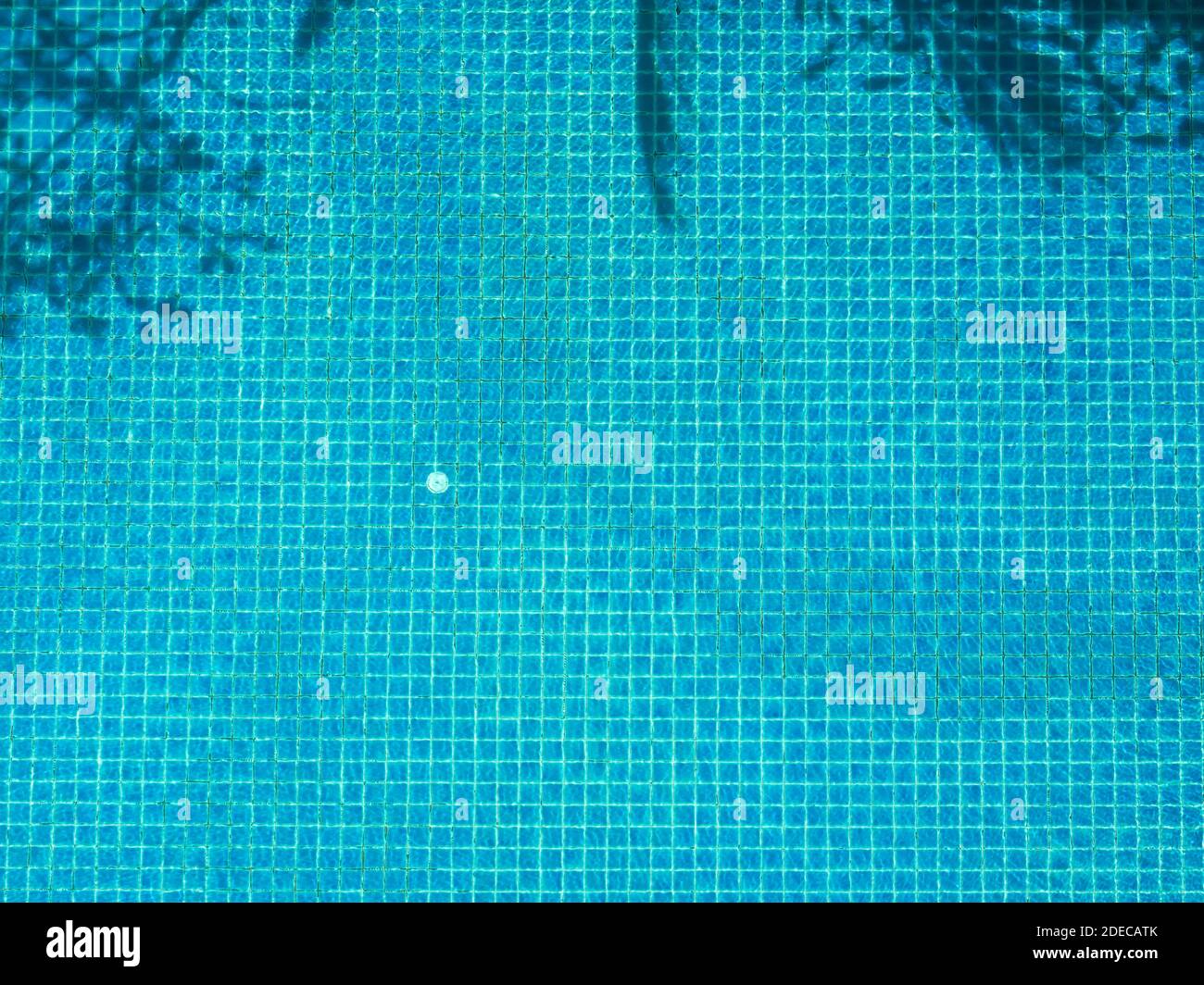 Blue pool background. Swimming pool bottom background with small square ...