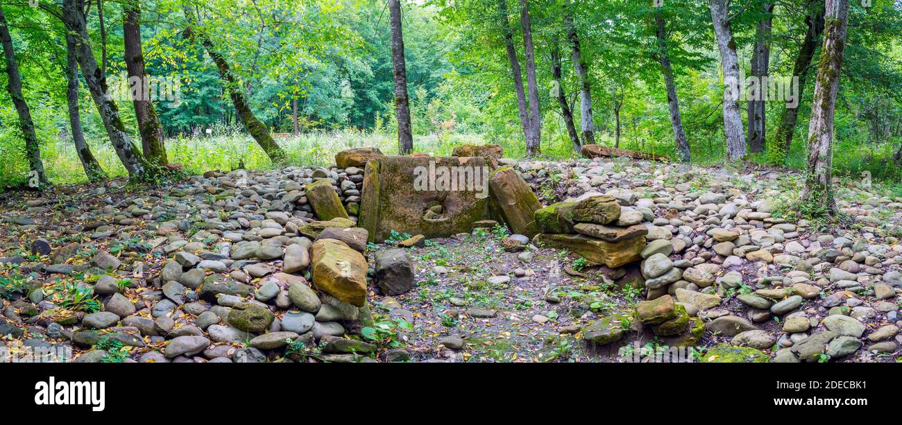 The stones of the destroyed ancient dolmen in Adygea in southern Russia ...