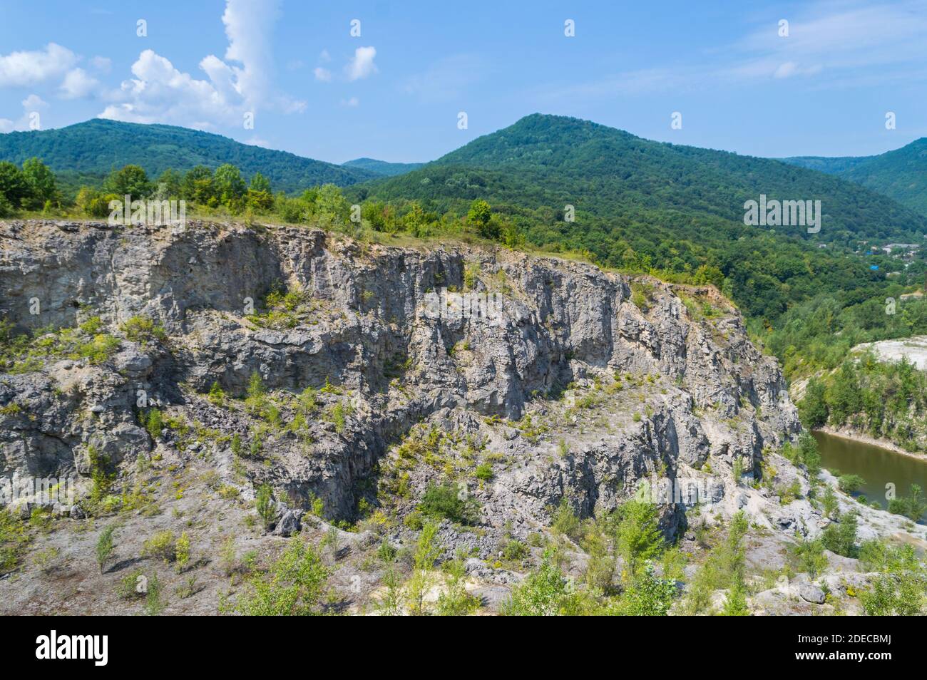 Panorama of abandoned and flooded quarry. Beautiful summer landscape in ...
