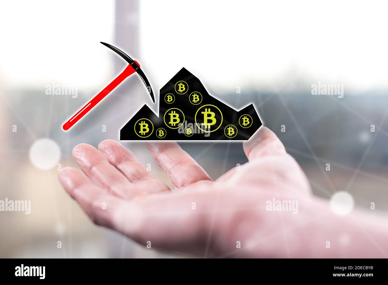 Bitcoin mining concept above a hand of a man Stock Photo - Alamy