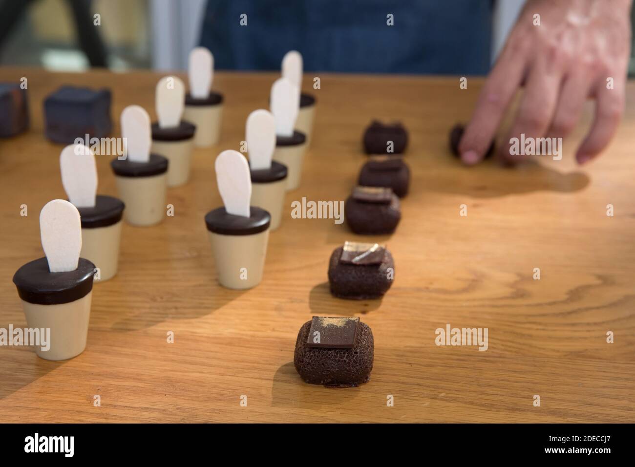 Chocolate flavoured mousse on a stick on a buffet table Stock Photo - Alamy