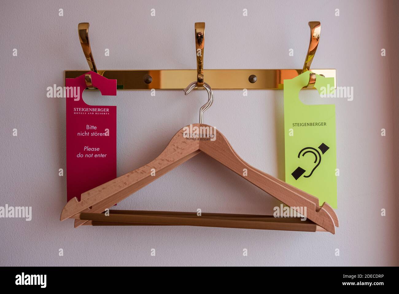 Still life with hangers in the room hotel floor Stock Photo - Alamy