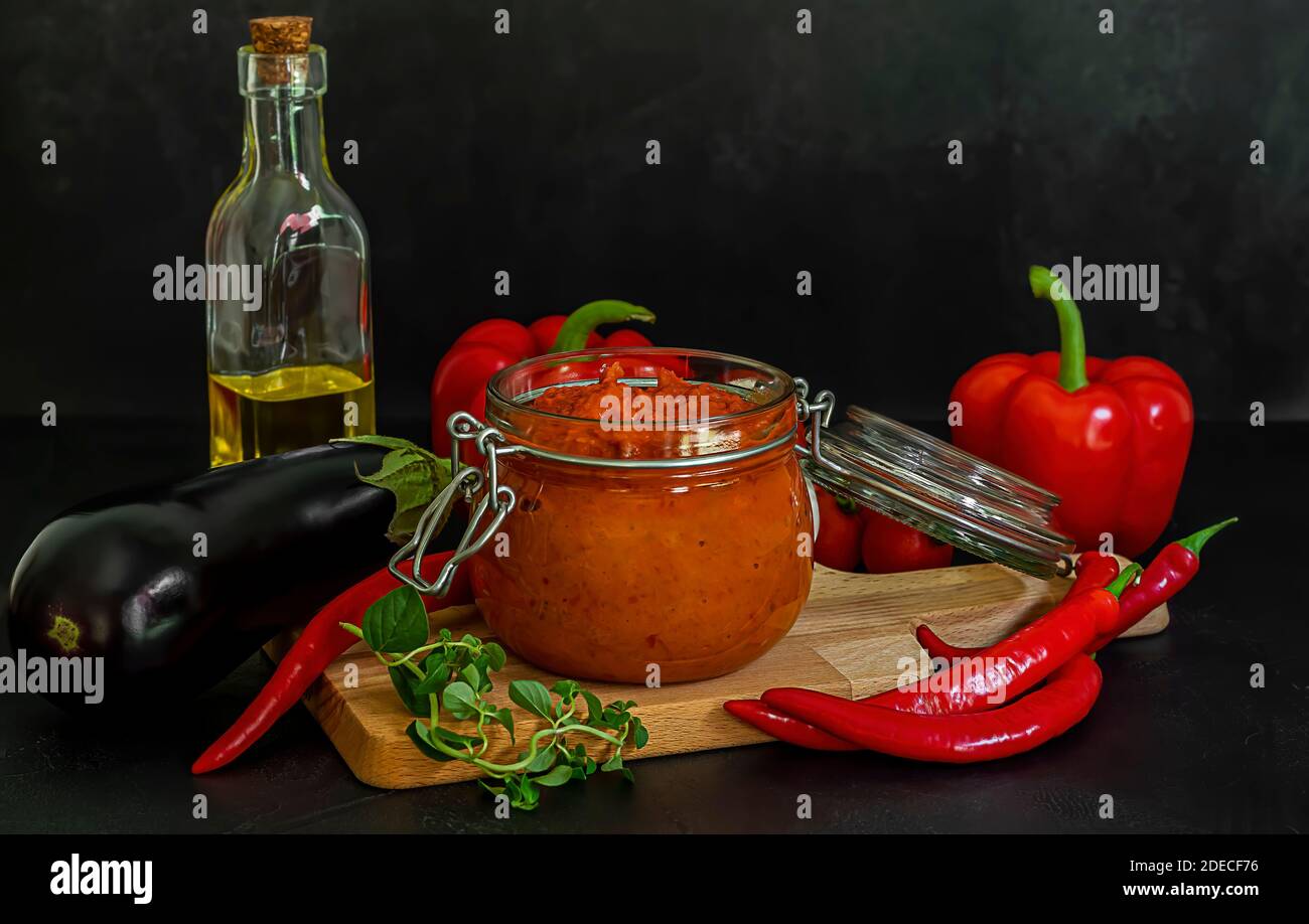 Traditional autumn Balkan vegan spread Ajvar or Aivar with ingredients ...