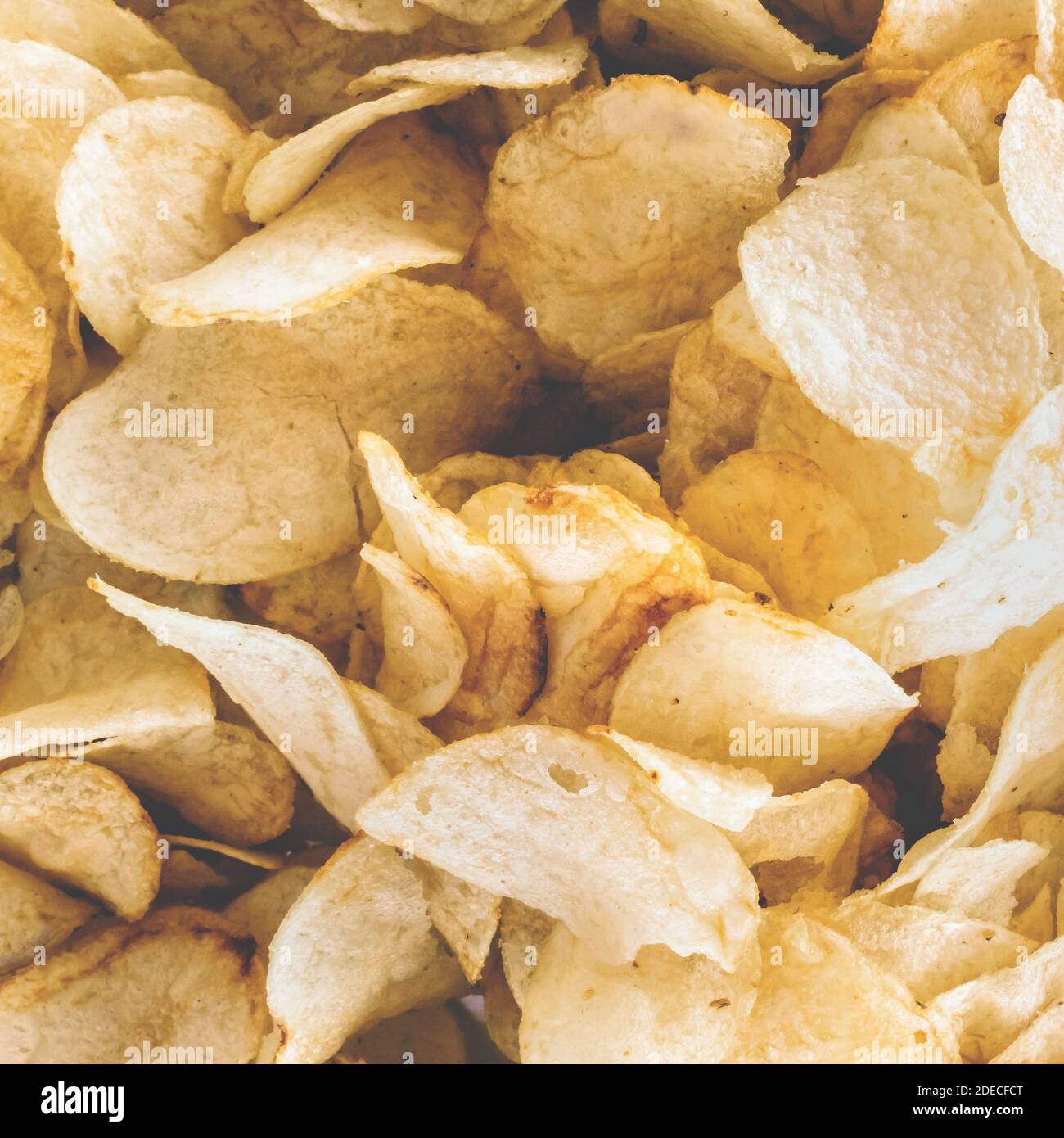 Rustic chips golden pattern. Crispy chips background. Yellow salted ...