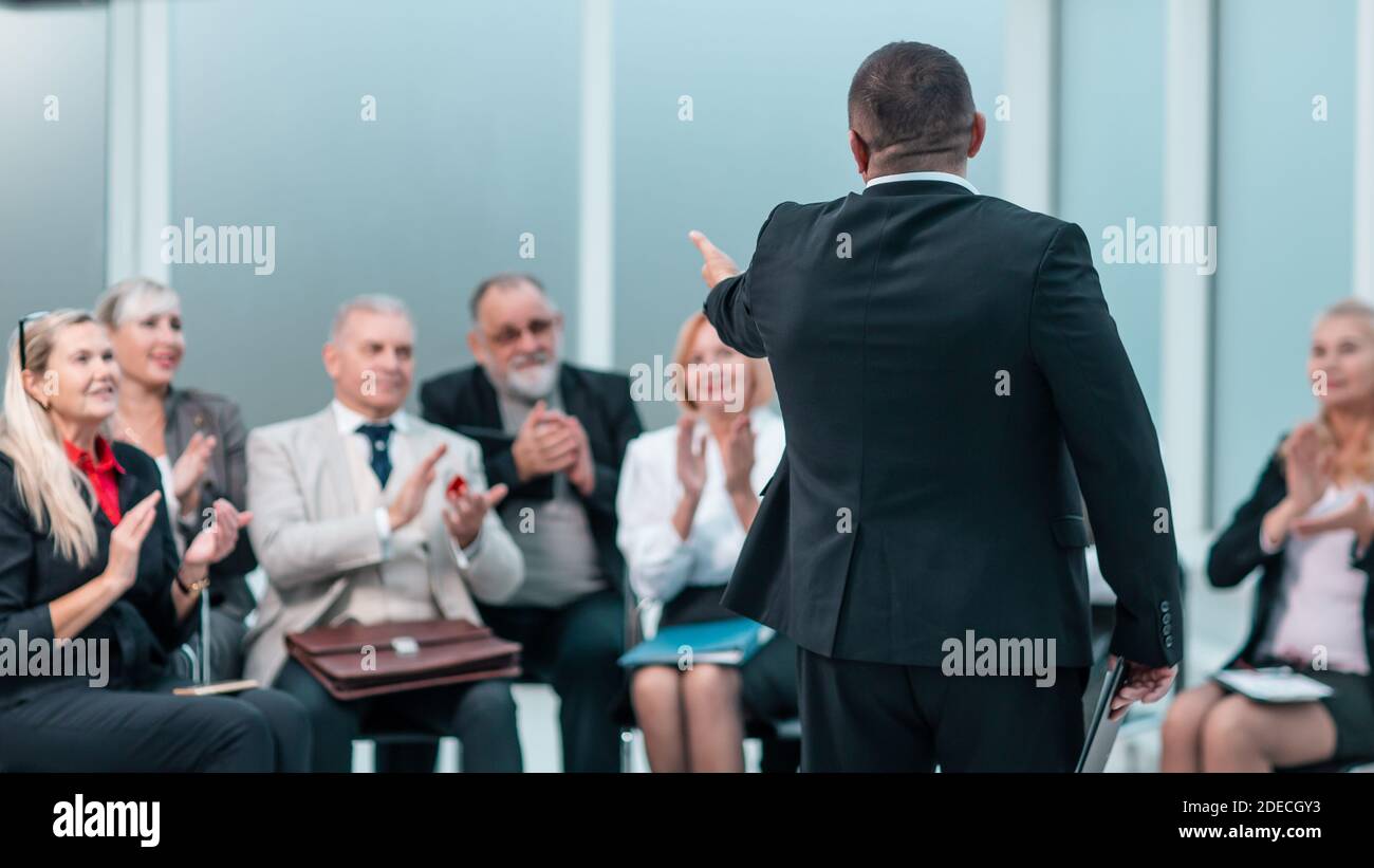 boss is answering questions from staff during the briefing Stock Photo ...