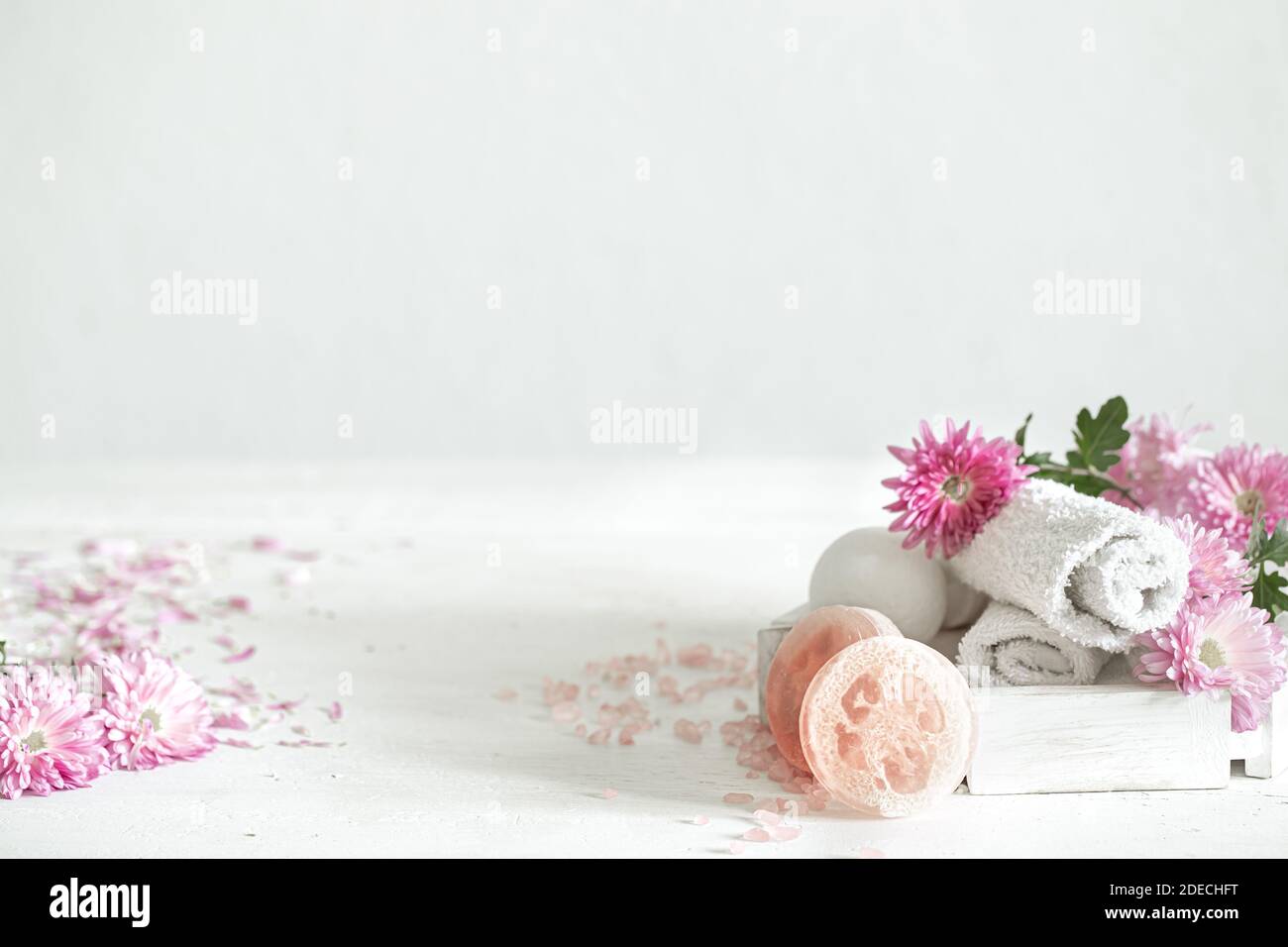 Spa background with products for personal hygiene and beauty with pink ...