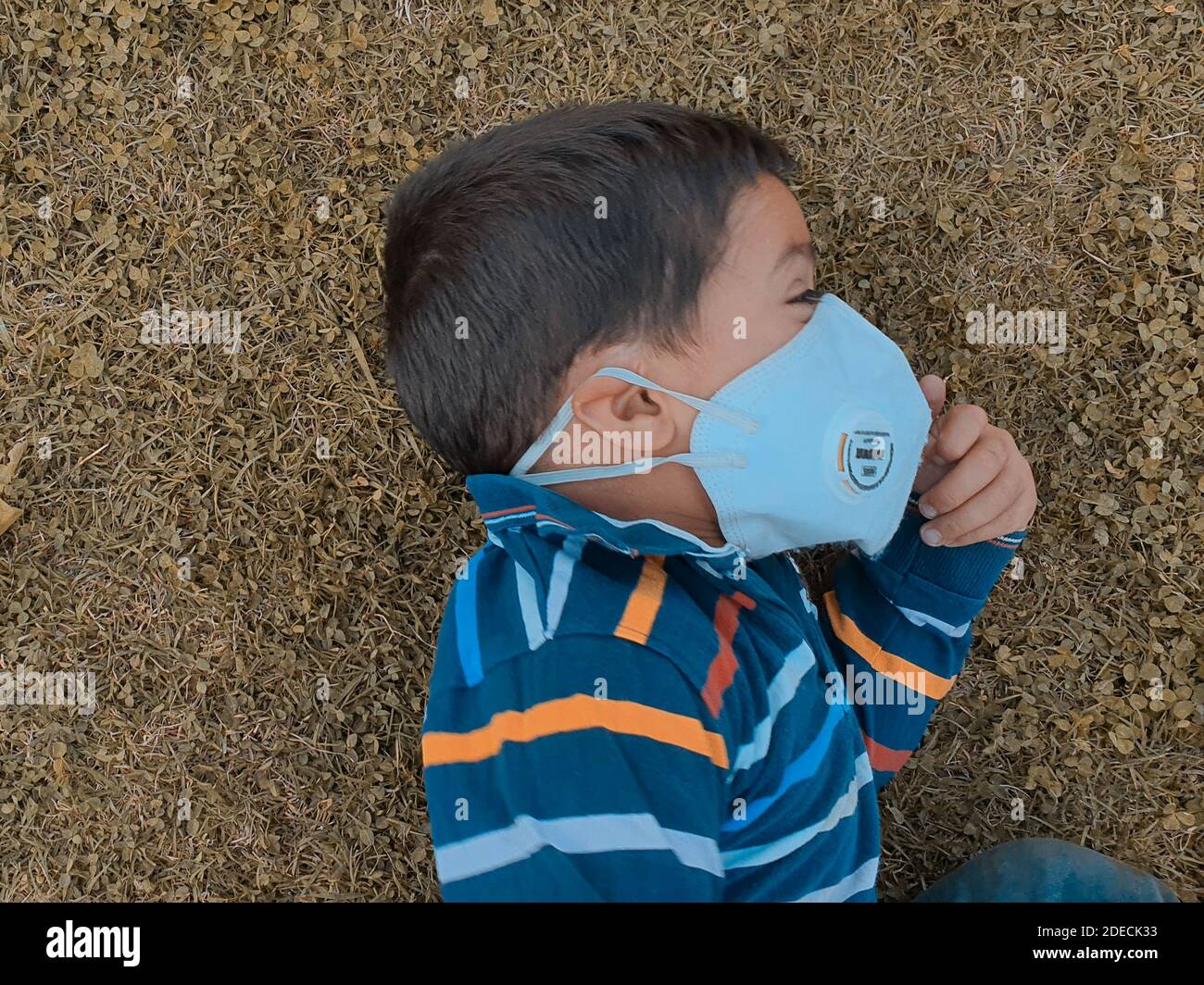 Children masked playing enjoying crying and smiling in park during ...