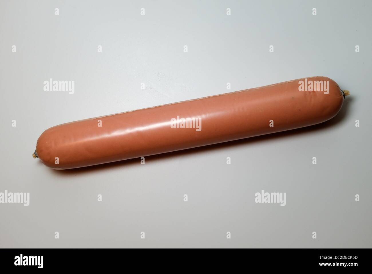 Sausages made from fish meat on a white background Stock Photo - Alamy