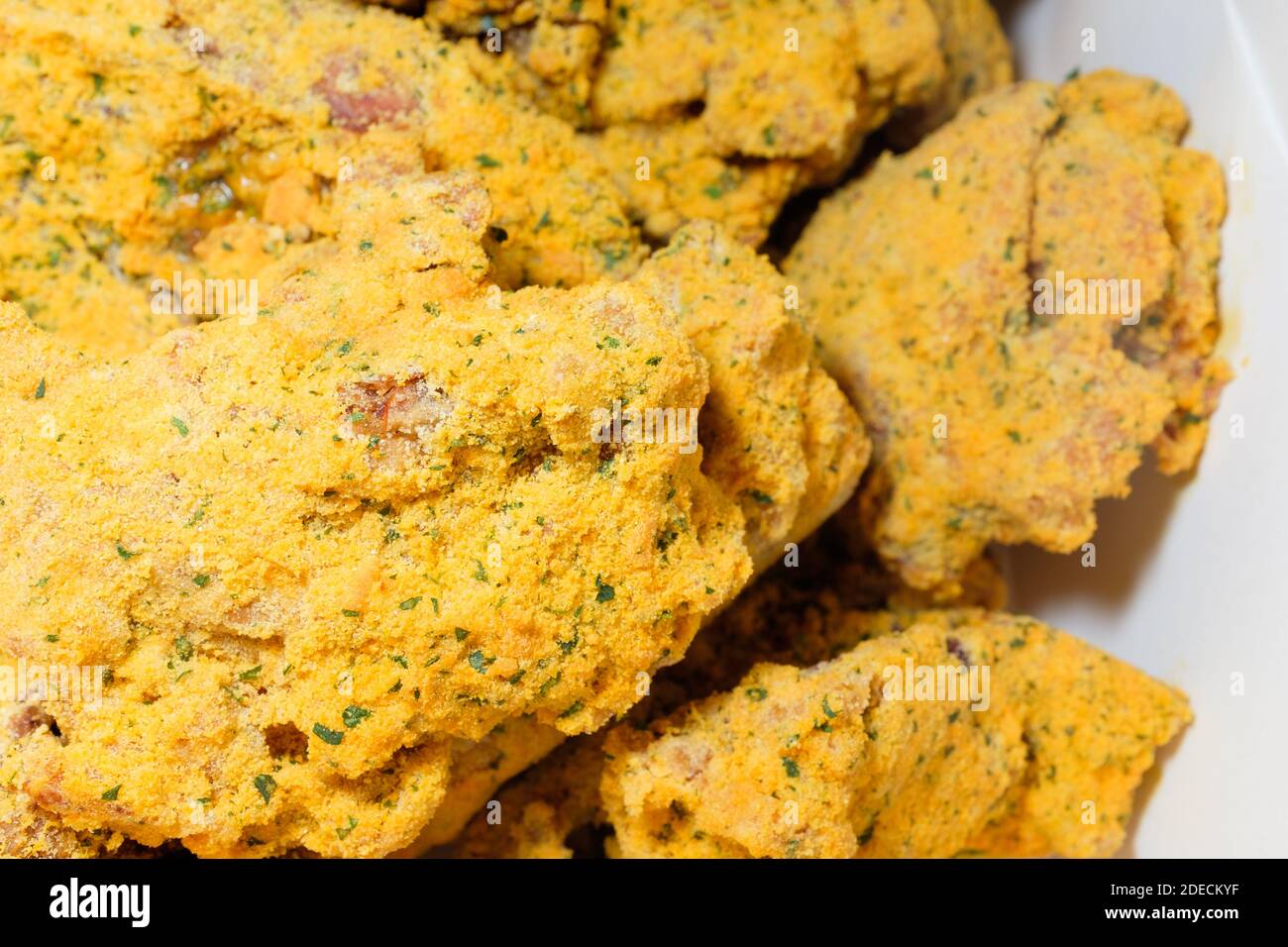 Fried Chicken Sprinkled with Yellow Seasoning Stock Photo - Alamy