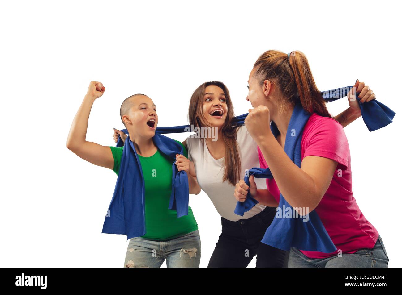 Teamwork. Female soccer fans cheering for favourite team with bright ...