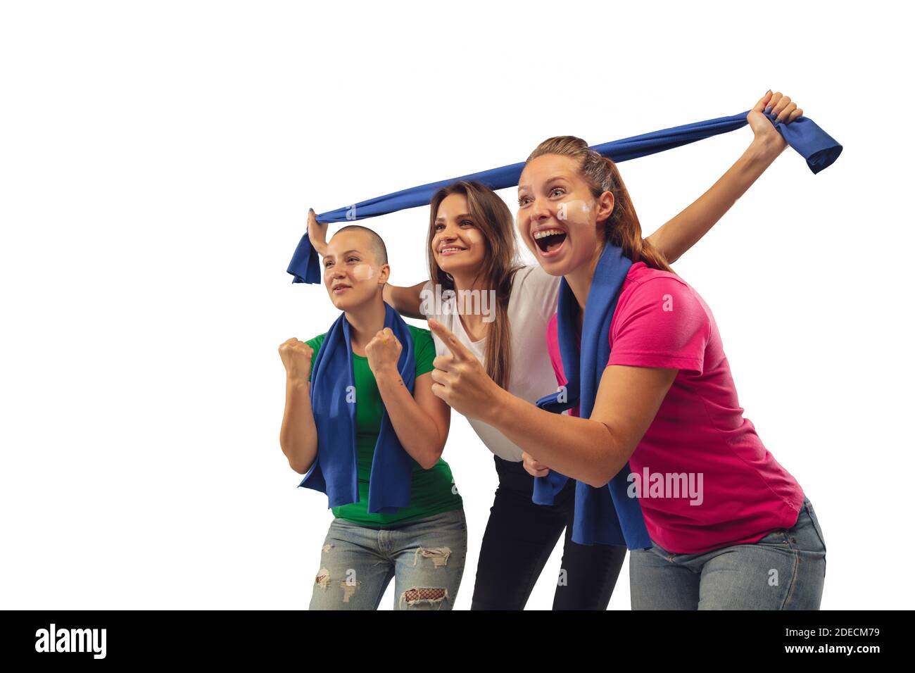 Teamwork. Female soccer fans cheering for favourite team with bright ...