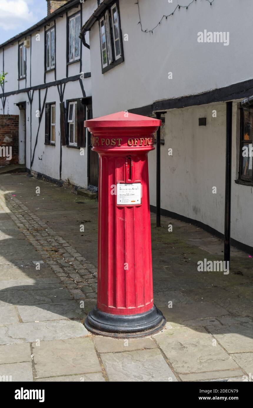 Historic red Victorian post box on the High Street, Eton, Berkshire, UK ...