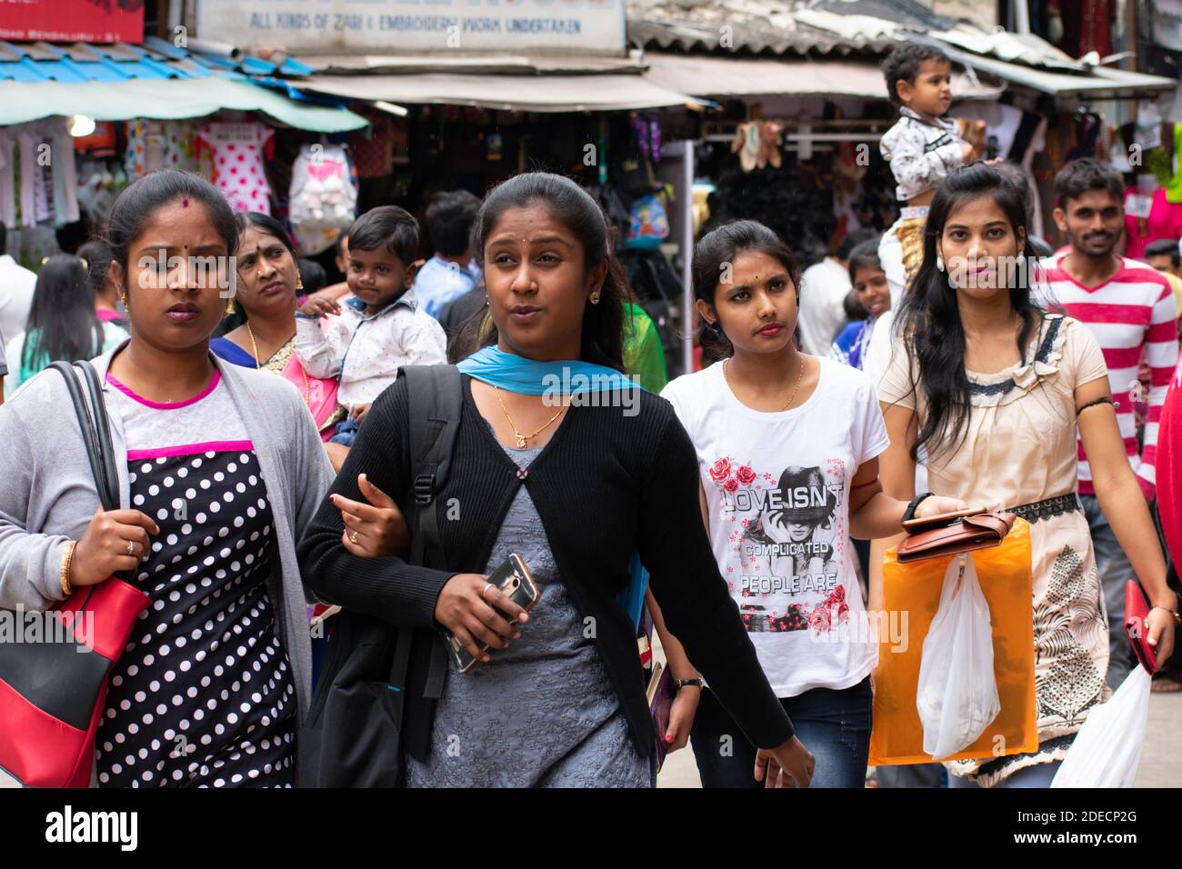 Bangalore, India - August 12, 2018: Local people in the crowded market ...