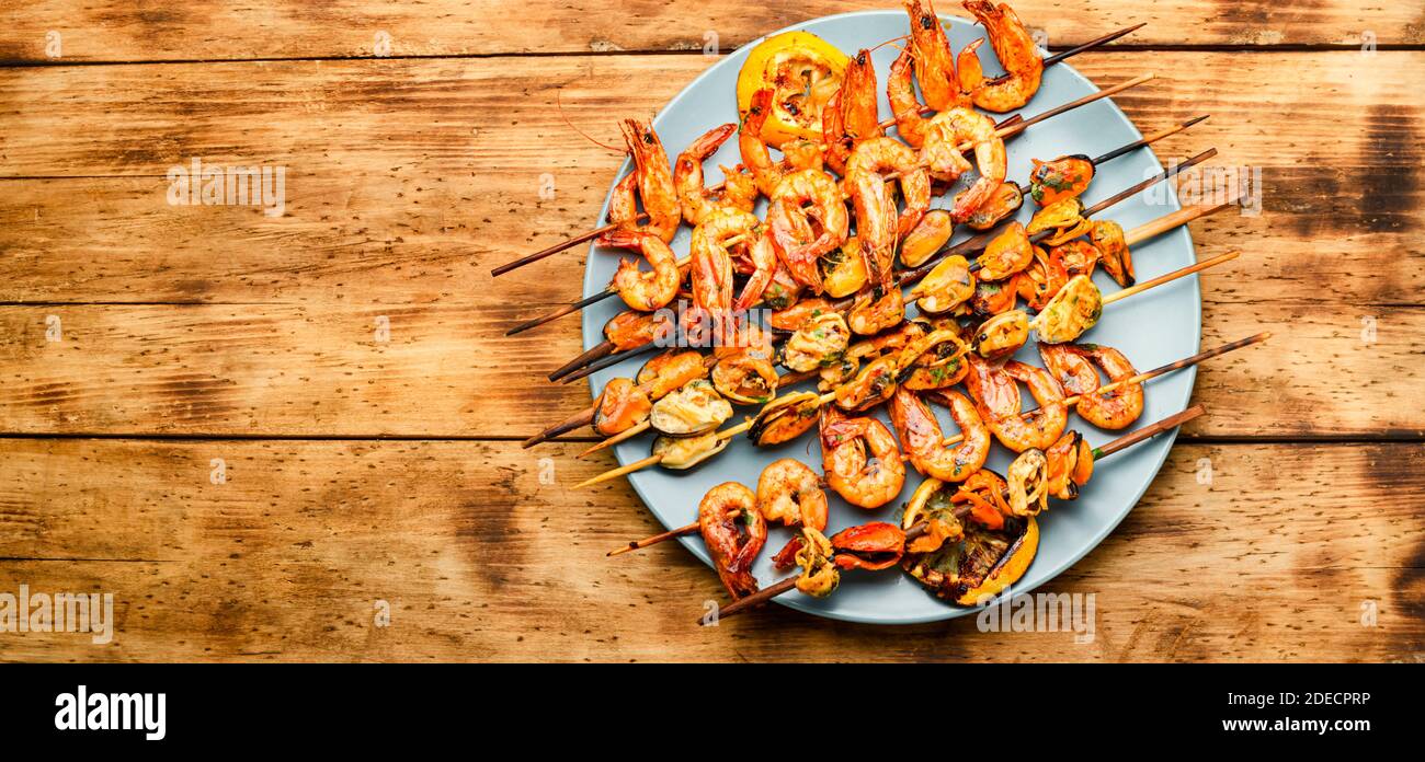 Grilled prawns,mussels and stuffed snails.Delicious seafood.Copy space ...