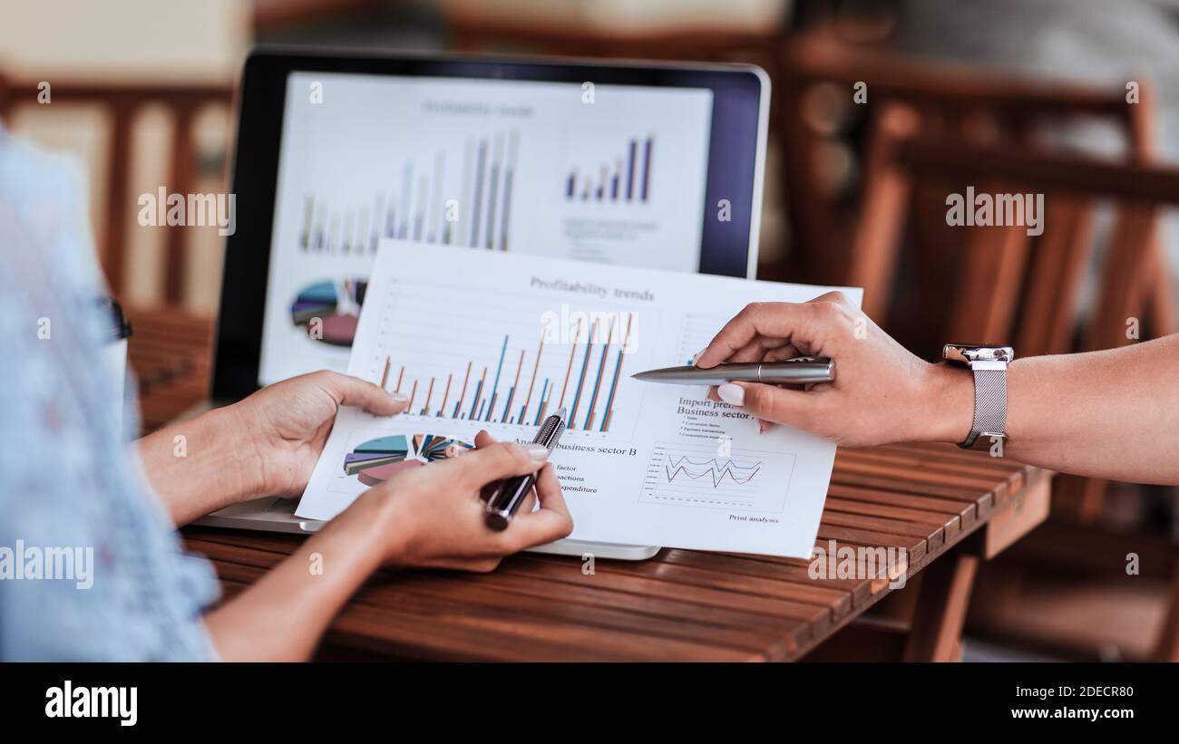close up. colleagues discussing the financial chart Stock Photo - Alamy