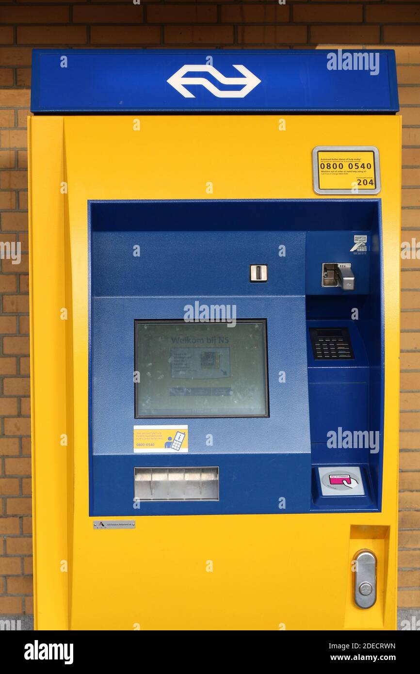 EINDHOVEN, NETHERLANDS - NOVEMBER 19, 2016: Ticket machine at railway ...