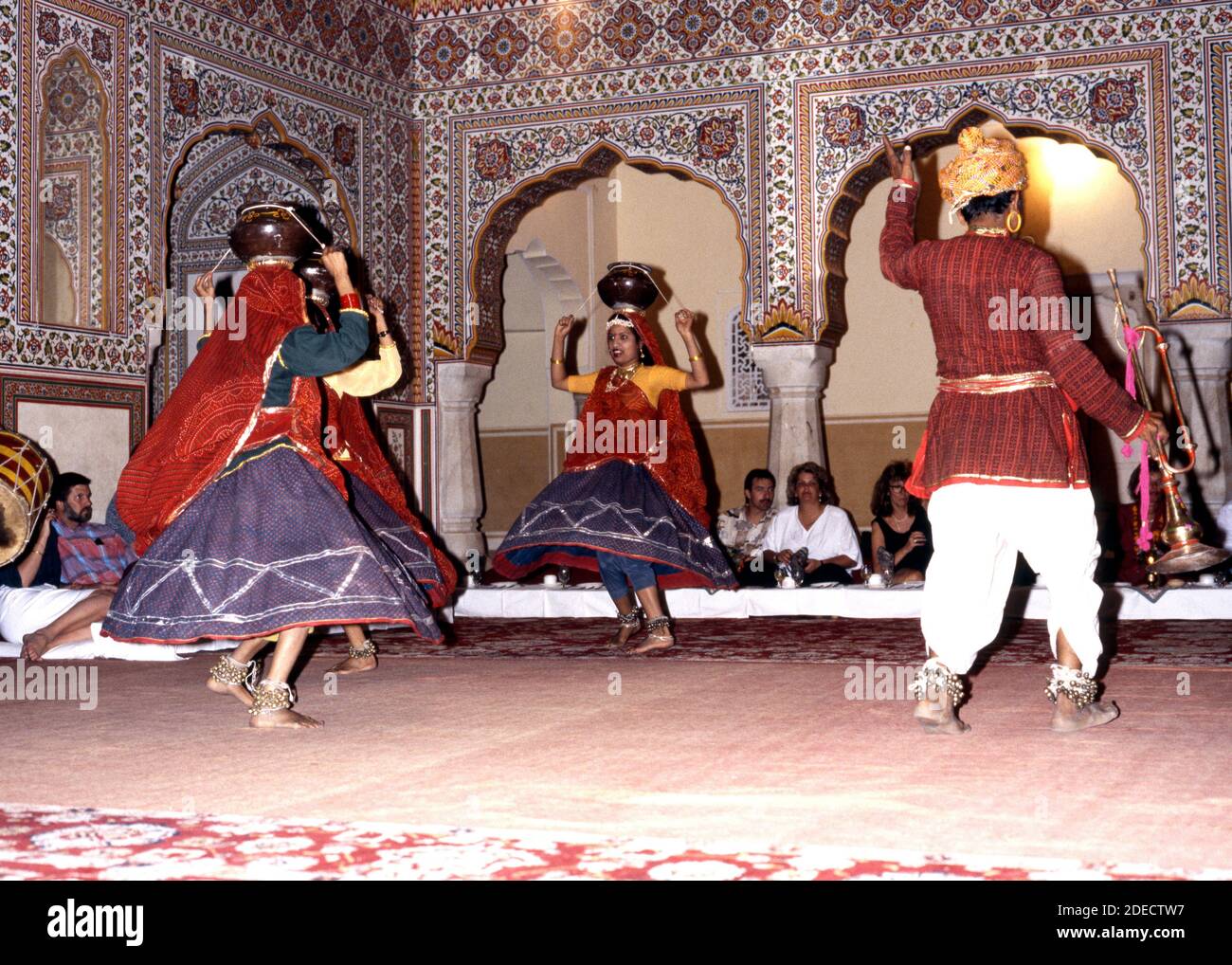 Indian woman balancing pots hi-res stock photography and images - Alamy