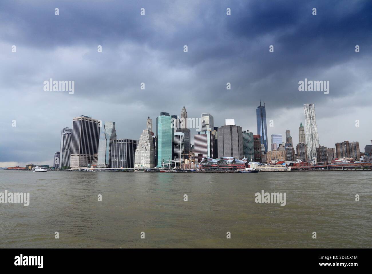 New York rain cloud cityscape - Manhattan skyline from Brooklyn Stock ...