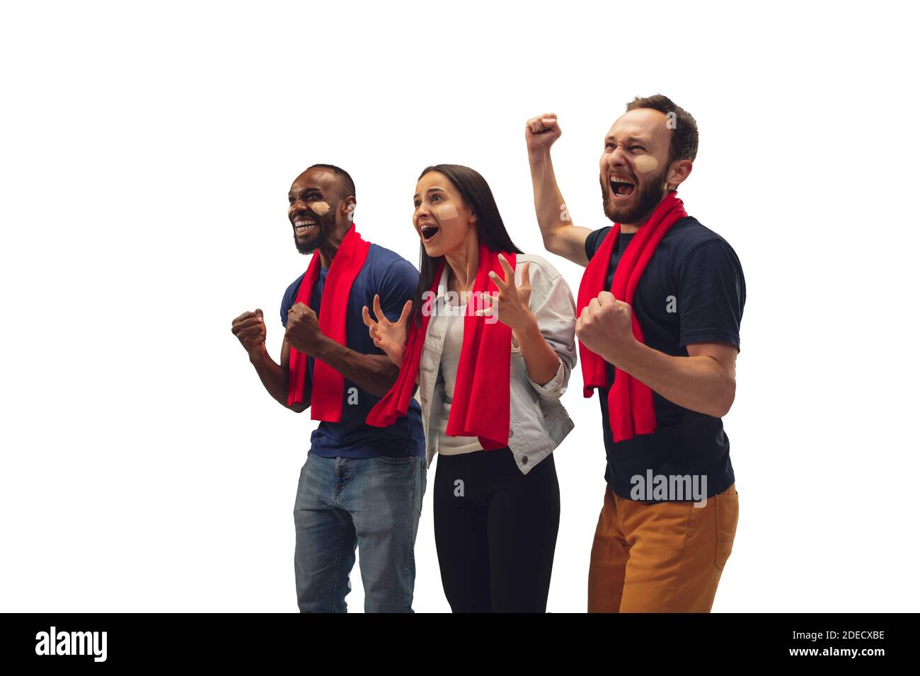 Togetherness. Multiethnic soccer fans cheering for favourite team with ...