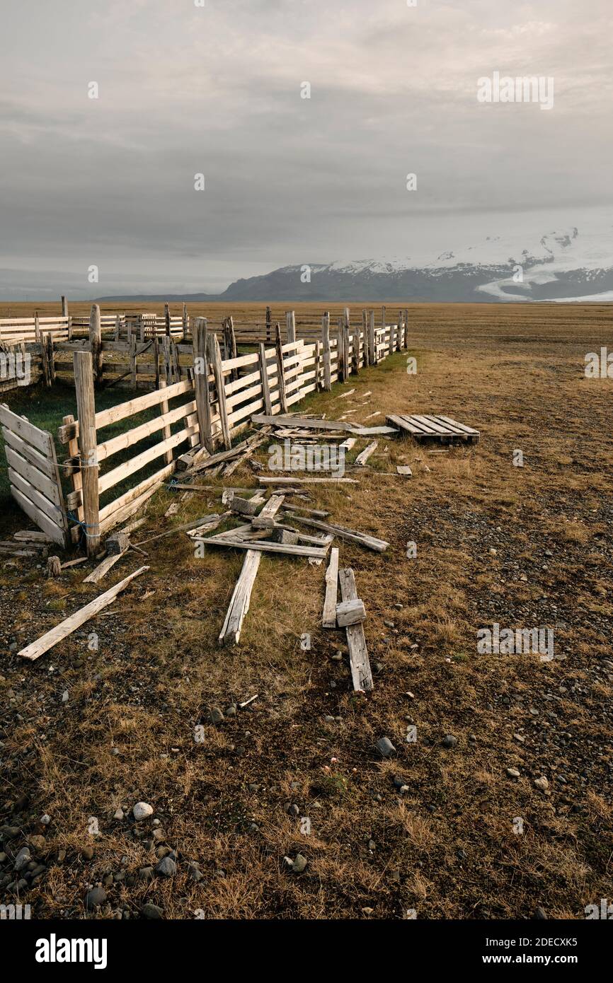 Abandoned sheep pens in the desolate empty flat landscape of the ...